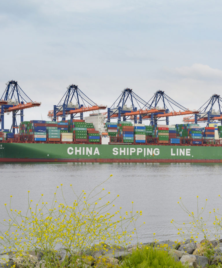 Container ship of China Shipping Line in port - Aluminum Now
